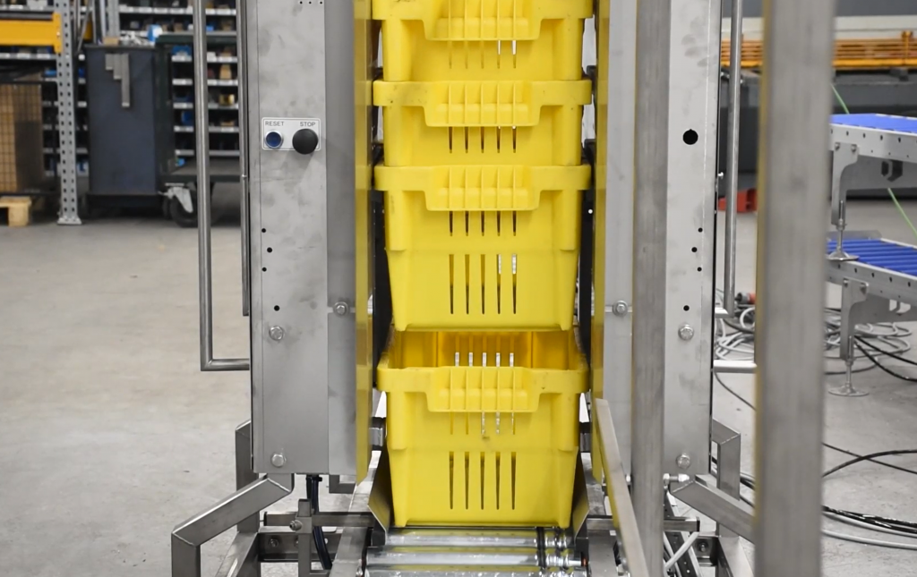 The solution to improve the process of stacking and destacking crates;